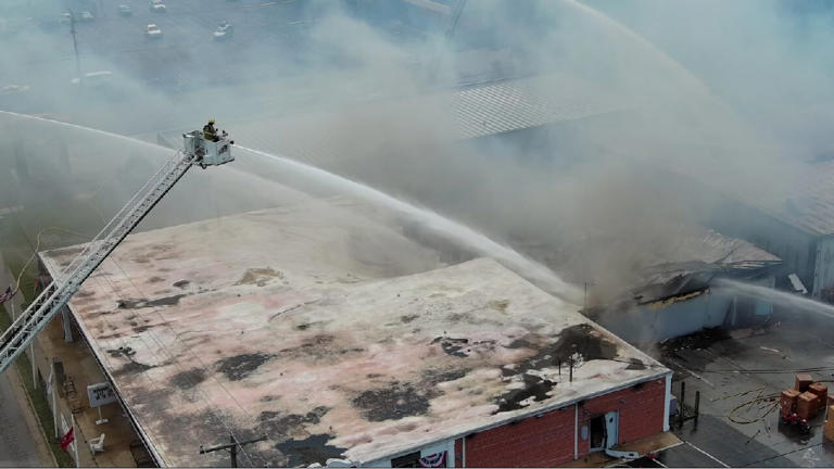 Five firefighters injured in major furniture store fire in Jacksonville