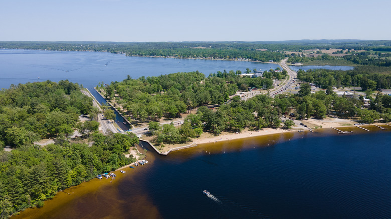 Tucked between two dazzling Michigan lakes is a state park for camping ...