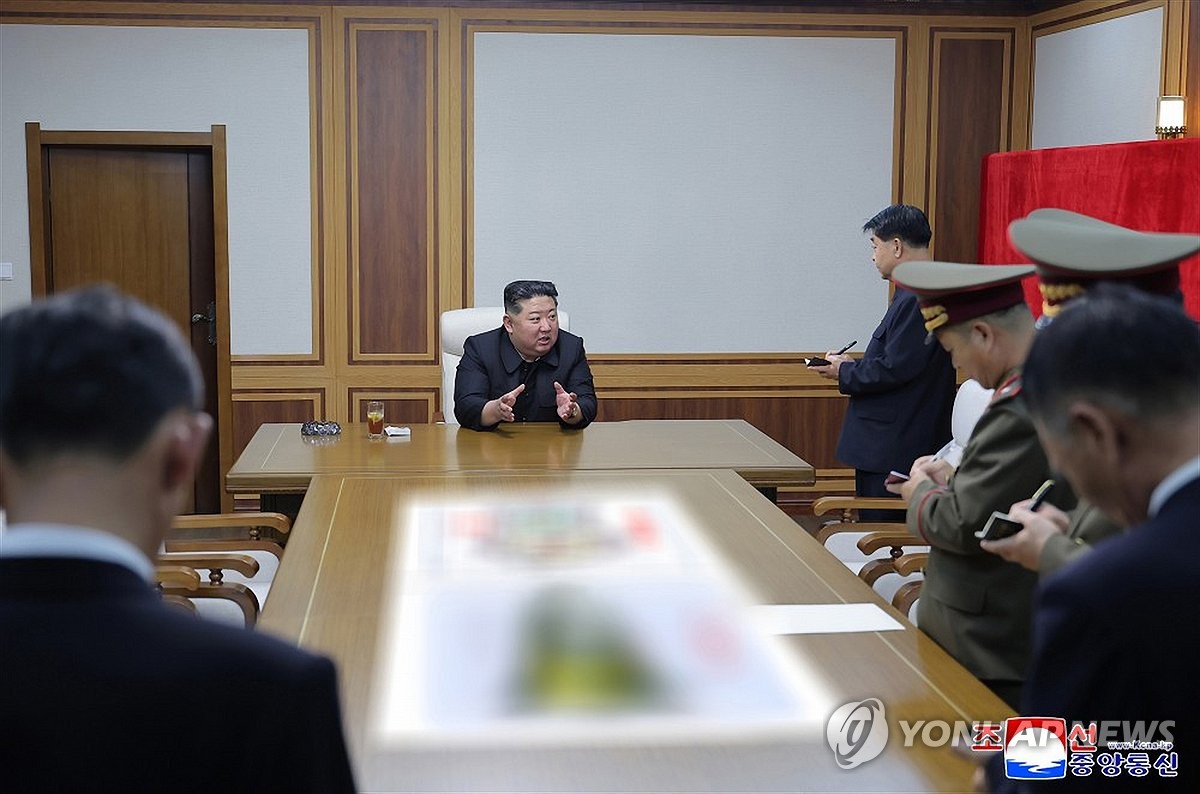 NK leader inspects new nuclear material production facility