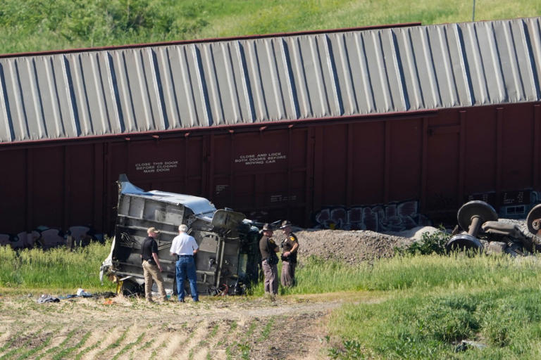 One dead and another injured after train strikes semi-truck in Iowa
