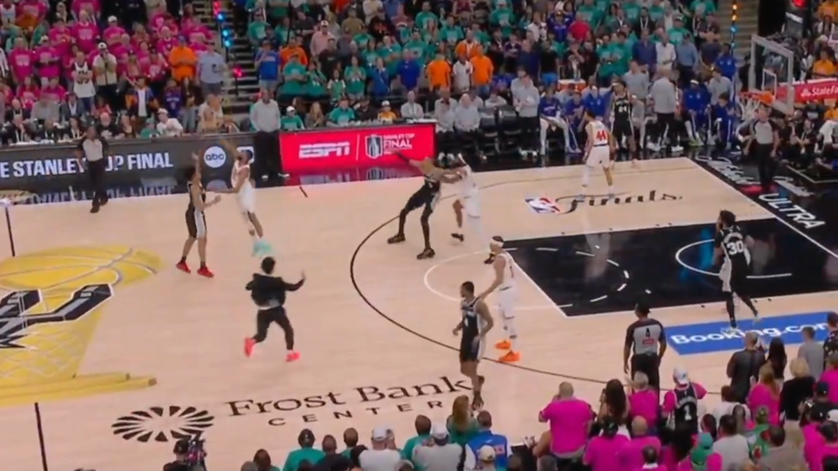 Fan runs on court during Game 1 of Knicks vs. Spurs NBA Finals