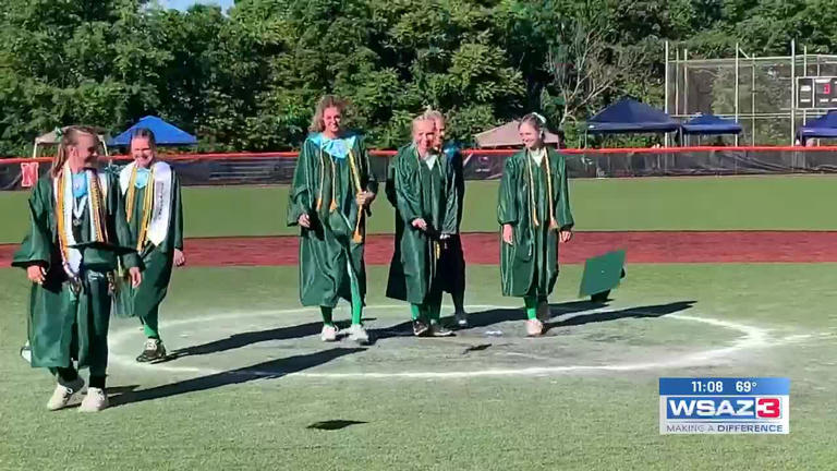 Some Winfield High softball players celebrate on-field graduation