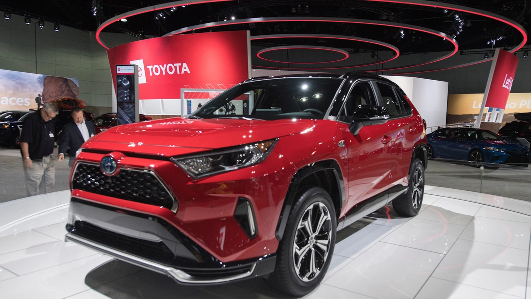 Comparing new Toyota RAV4 and used Lexus LS