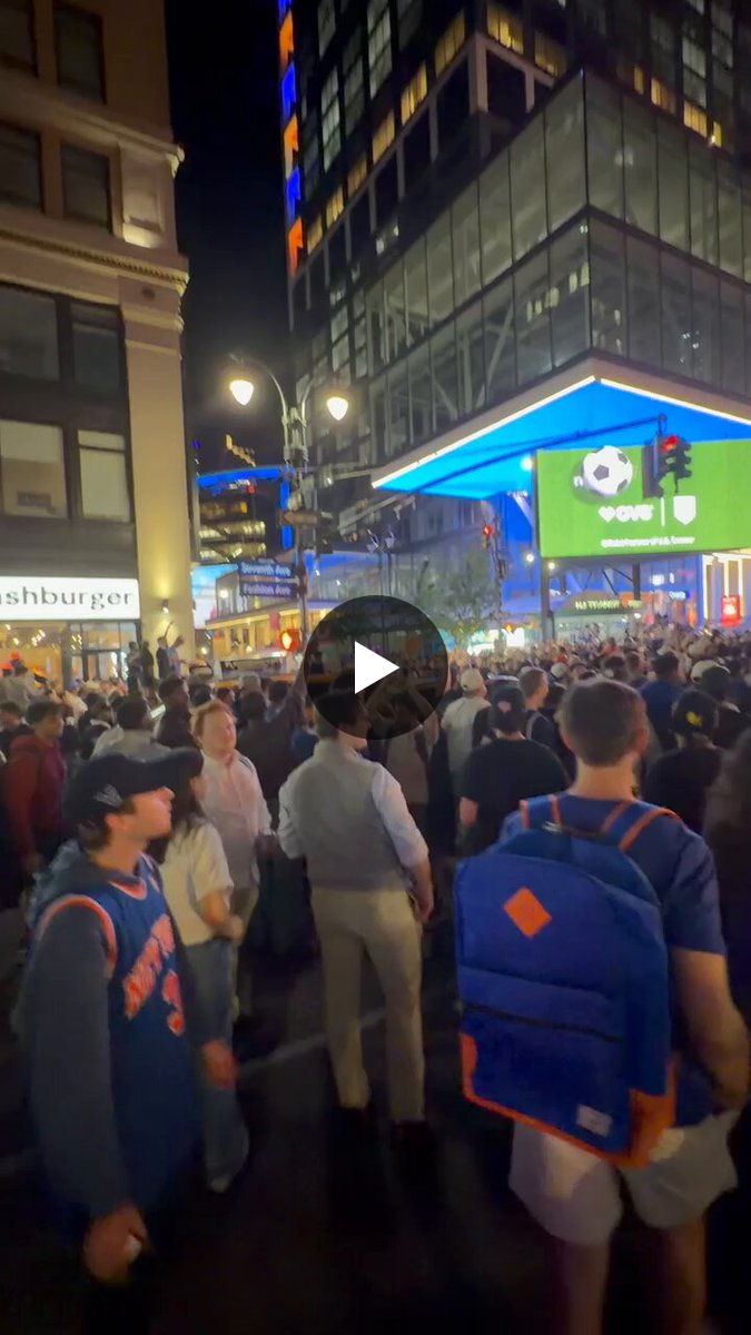 Knicks fans climb street poles and an ambulance to celebrate Game 1 ...