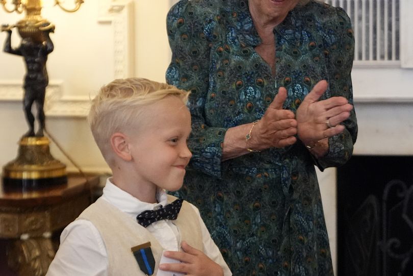 Gravely ill little boy tells Queen 'what a happy event' as Camilla ...
