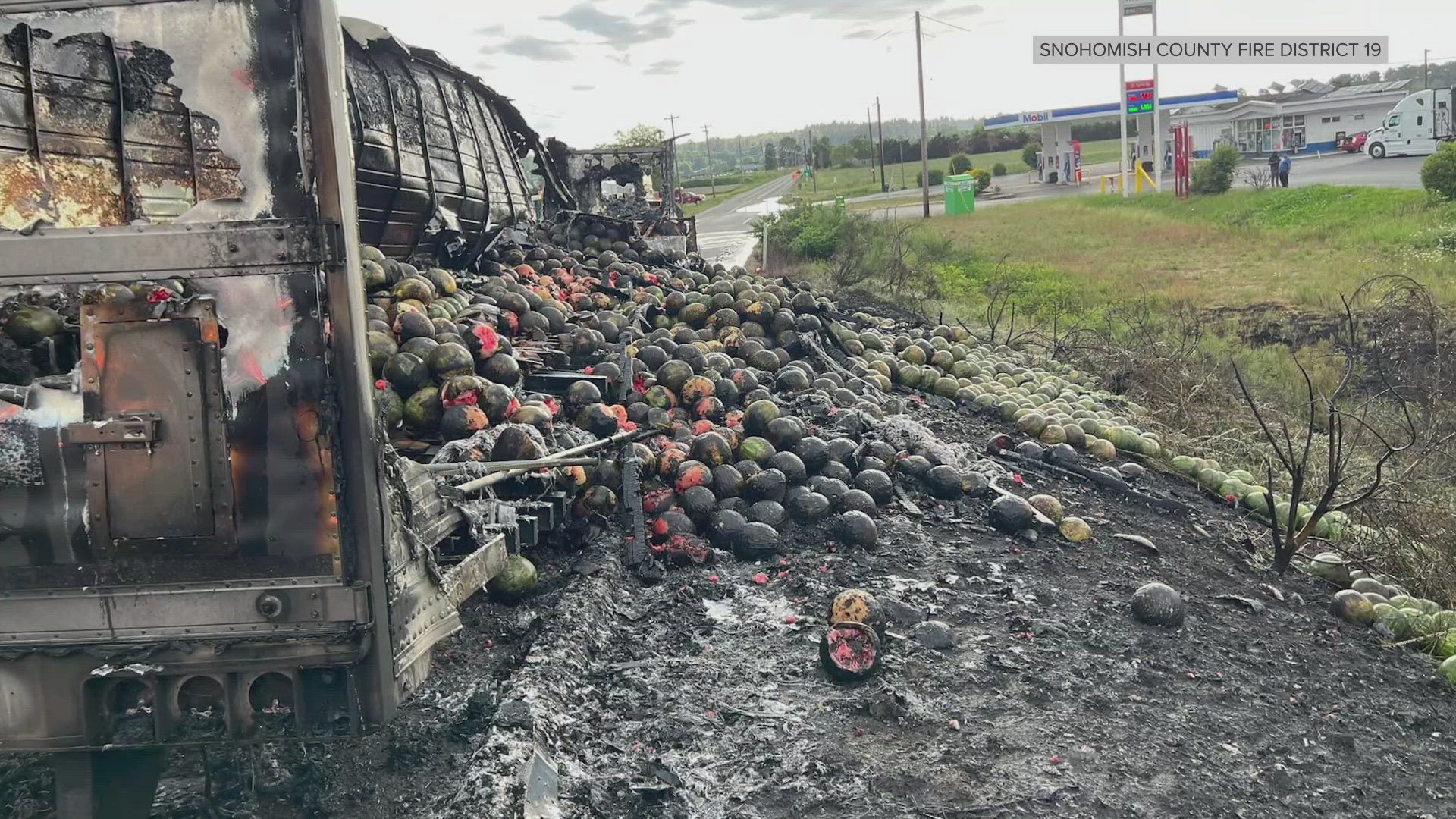 Truck carrying watermelons catches on fire