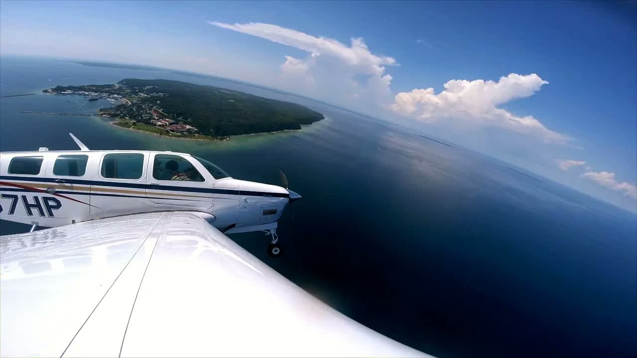 Watch a plane land on an island where cars are banned - like stepping ...