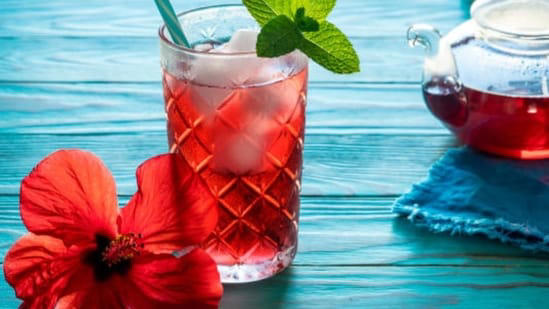 Homemade hibiscus tea recipe with lemon and ice creates a refreshing ...