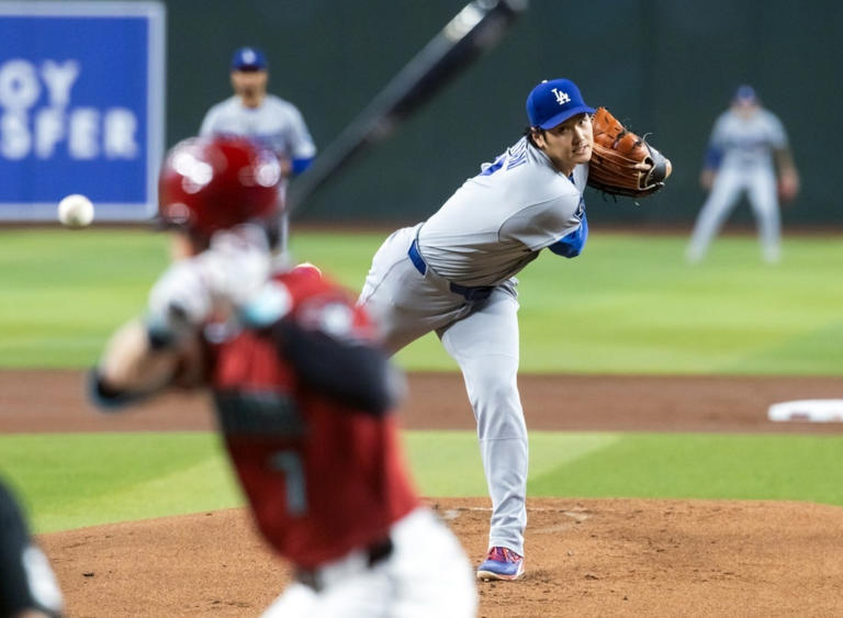 Shohei Ohtani shines on mound, at plate as Dodgers blank D-backs
