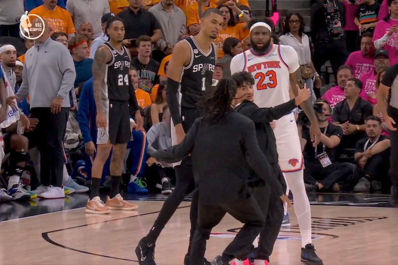 NBA Finals interrupted as fan rushes stunned Victor Wembanyama to take ...