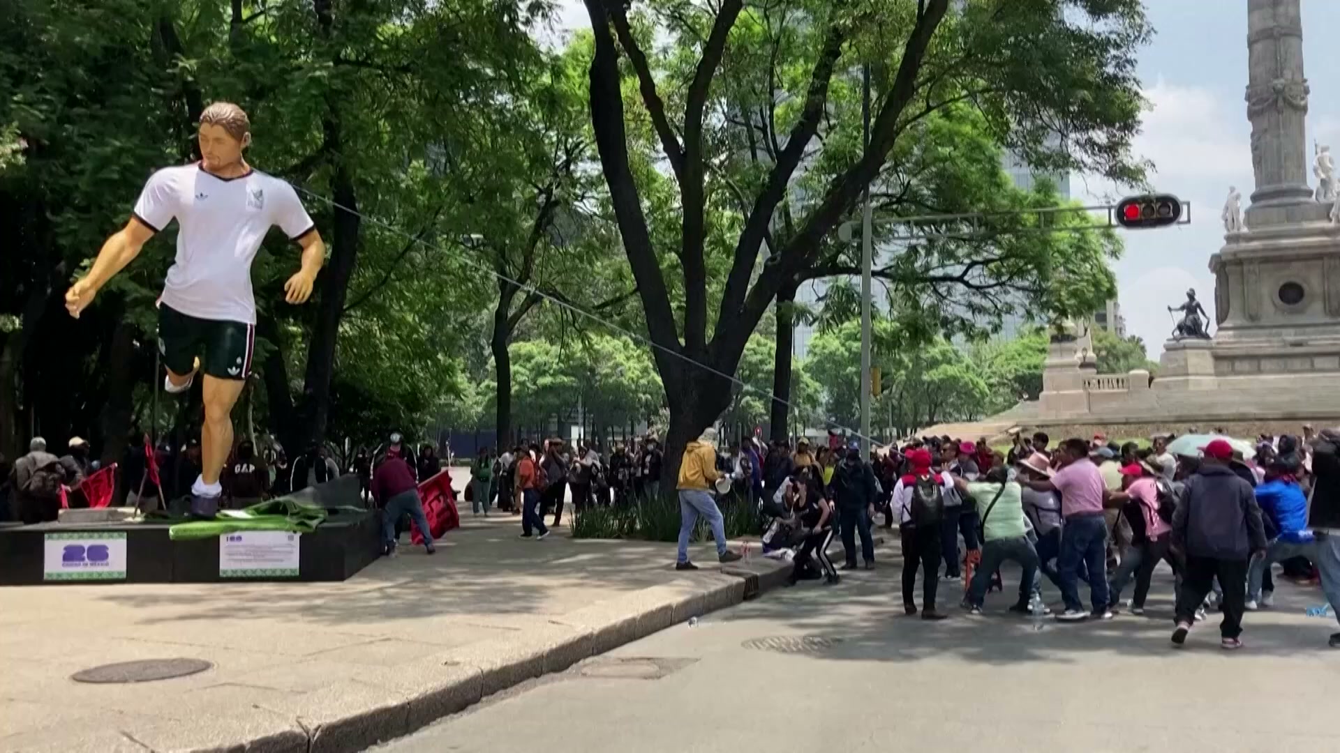World Cup player statues toppled during protest in Mexico City