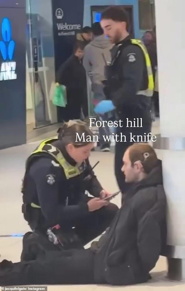 Man with large knife forces terrified shoppers to barricade themselves ...