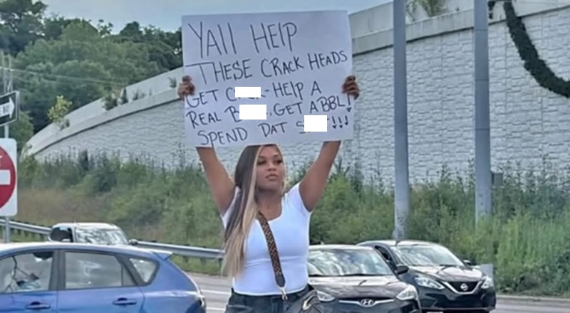 Woman holds sign asking for BBL donations instead of helping "crack ...