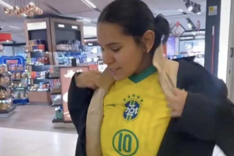 Woman avoids Ryanair extra fee by wearing all the clothes from her bag