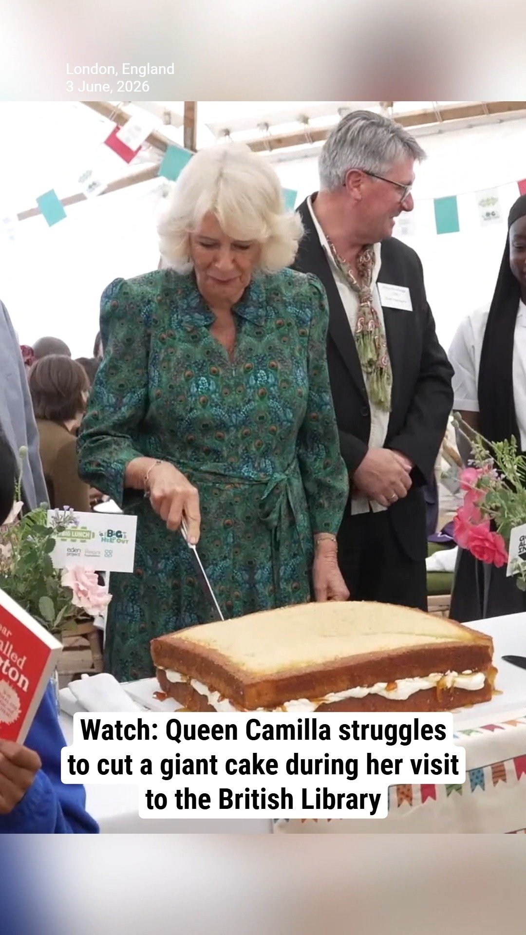 Watch: Queen Camilla struggles to cut a giant cake during her visit to ...