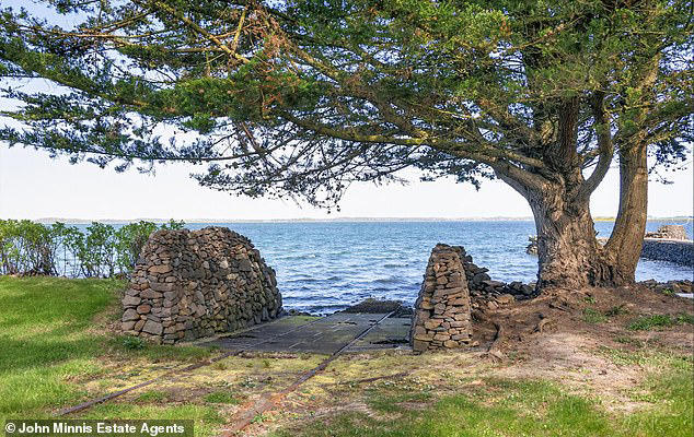 Island home with private jetty and stables on sale for £1.15m