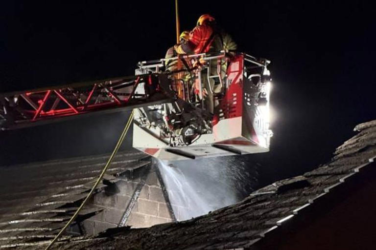 Moment lightning bolt strikes house in Wales sparking huge fire