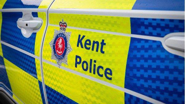 Armed police called to Kent street and arrest man