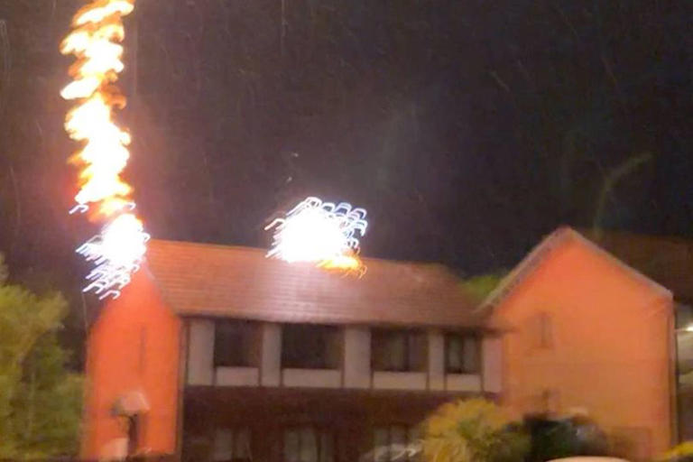 Moment lightning bolt strikes house in Wales sparking huge fire