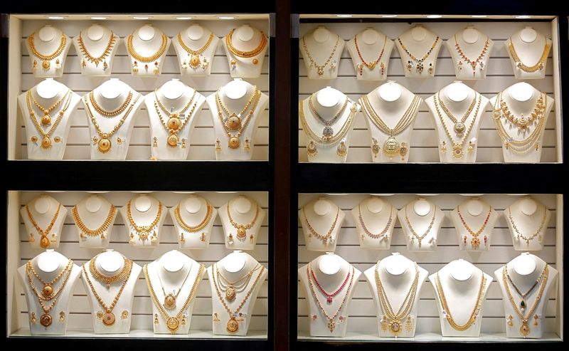 Gold gains as Middle East peace optimism pushes dollar, oil prices lower