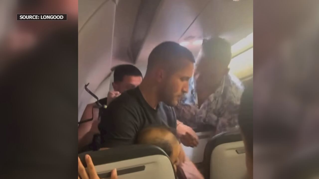 Hero from Mansfield helps restrain man on Frontier flight who tried ...