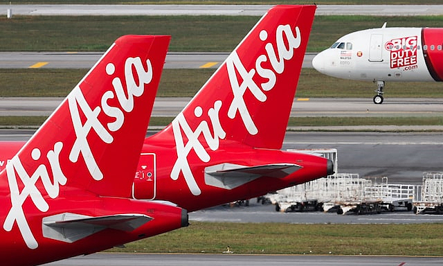 AirAsia reviews rules after family with cerebral palsy child removed ...
