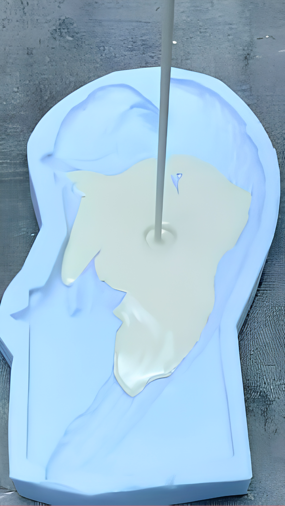 Pouring Plaster Into Silicone Mold Casting