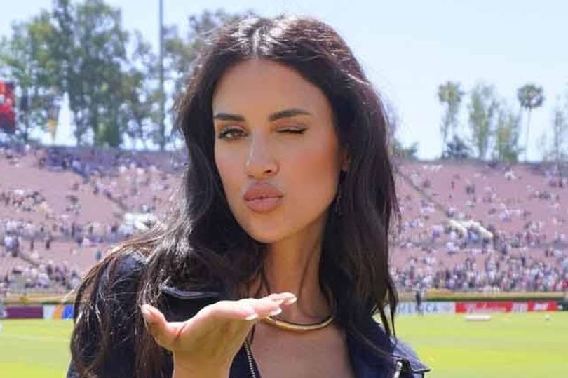 Glam model turned football presenter heads to World Cup despite her ...