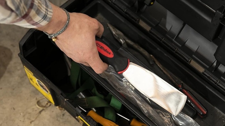 The Amazon Tool That Makes Removing Grass & Mud From The Mower So Handy