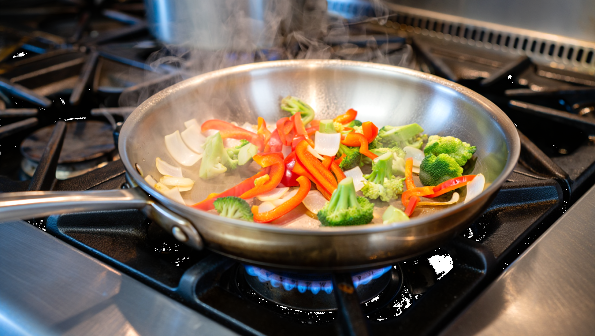 The simple kitchen trick that stops food sticking to your stainless ...