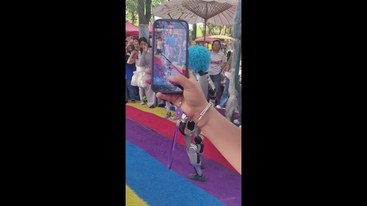 Robot kick accidentally hits boy during demonstration in Xinjiang, China