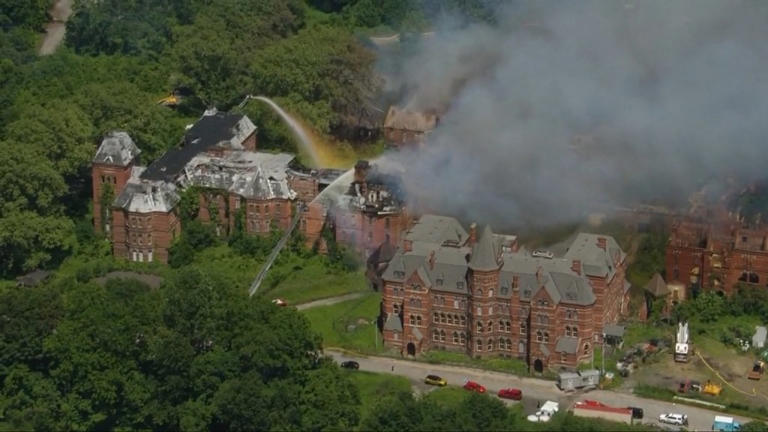 Massive inferno tears through historic New York psychiatric center