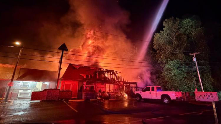 Crews respond to large fire at mobile home supply store in Morganton