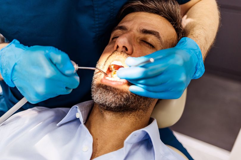 Three red flag problems that could mean your teeth are 'wearing down'
