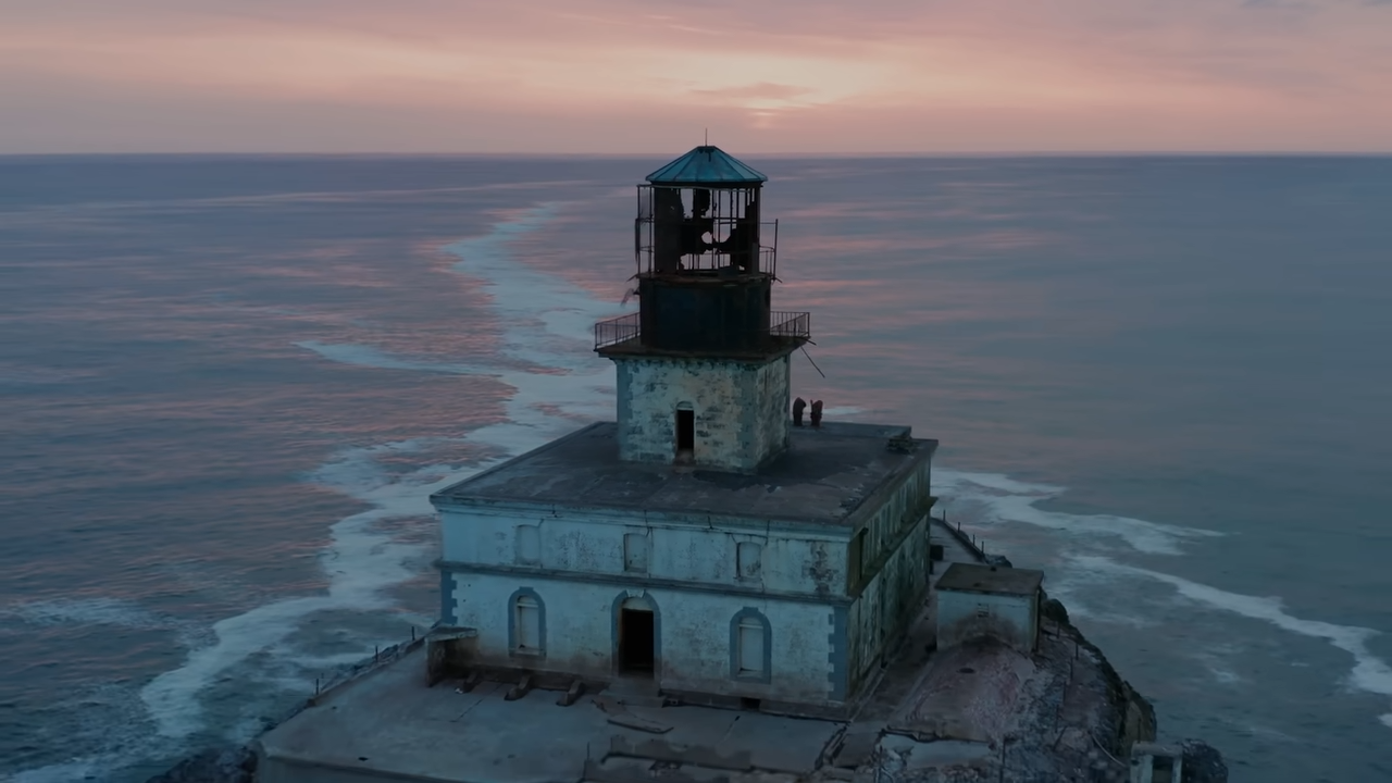 Watch waves crash over a 136-foot lighthouse - then shatter its lens