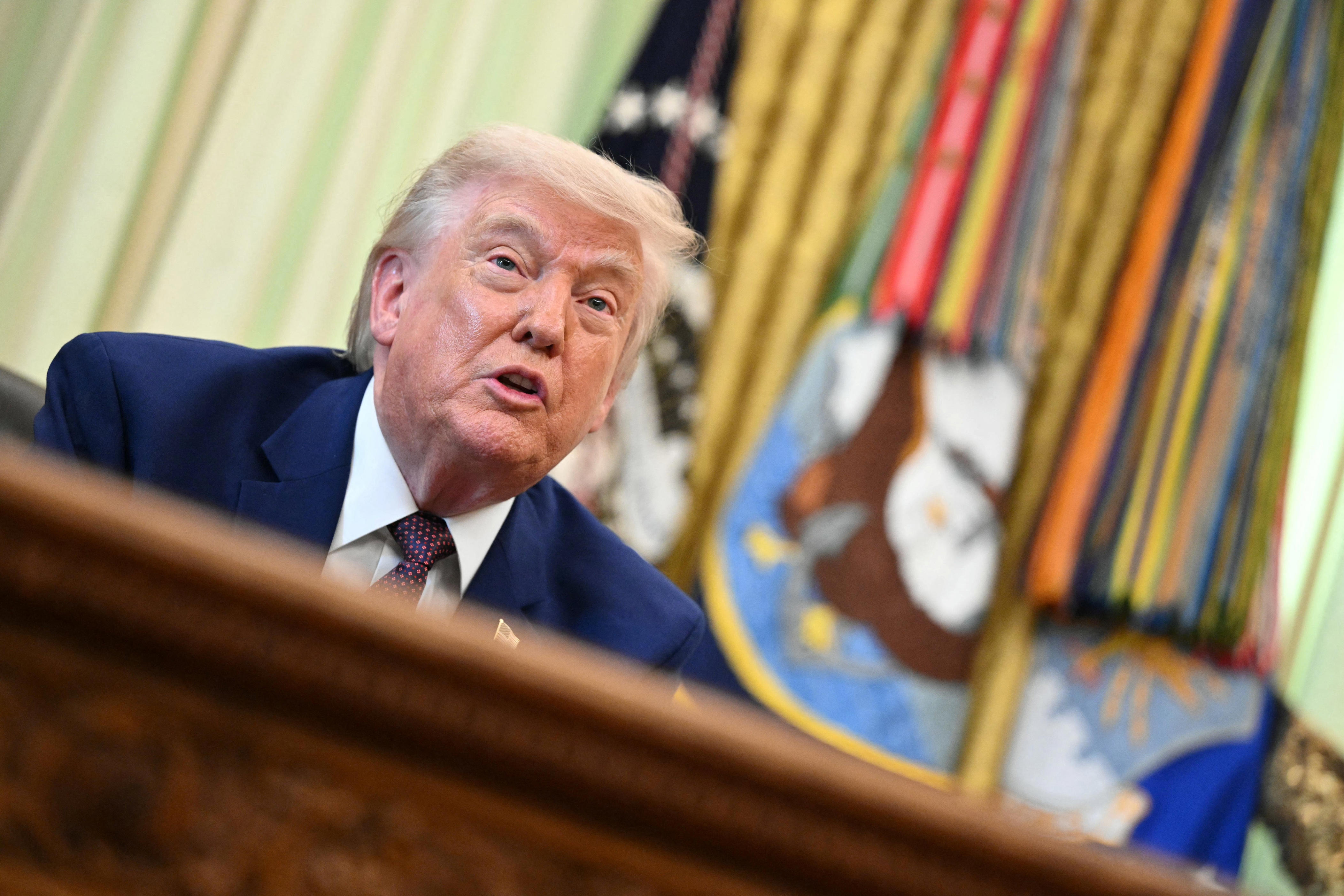 Trump pardons ex-Indiana congressman convicted of insider trading