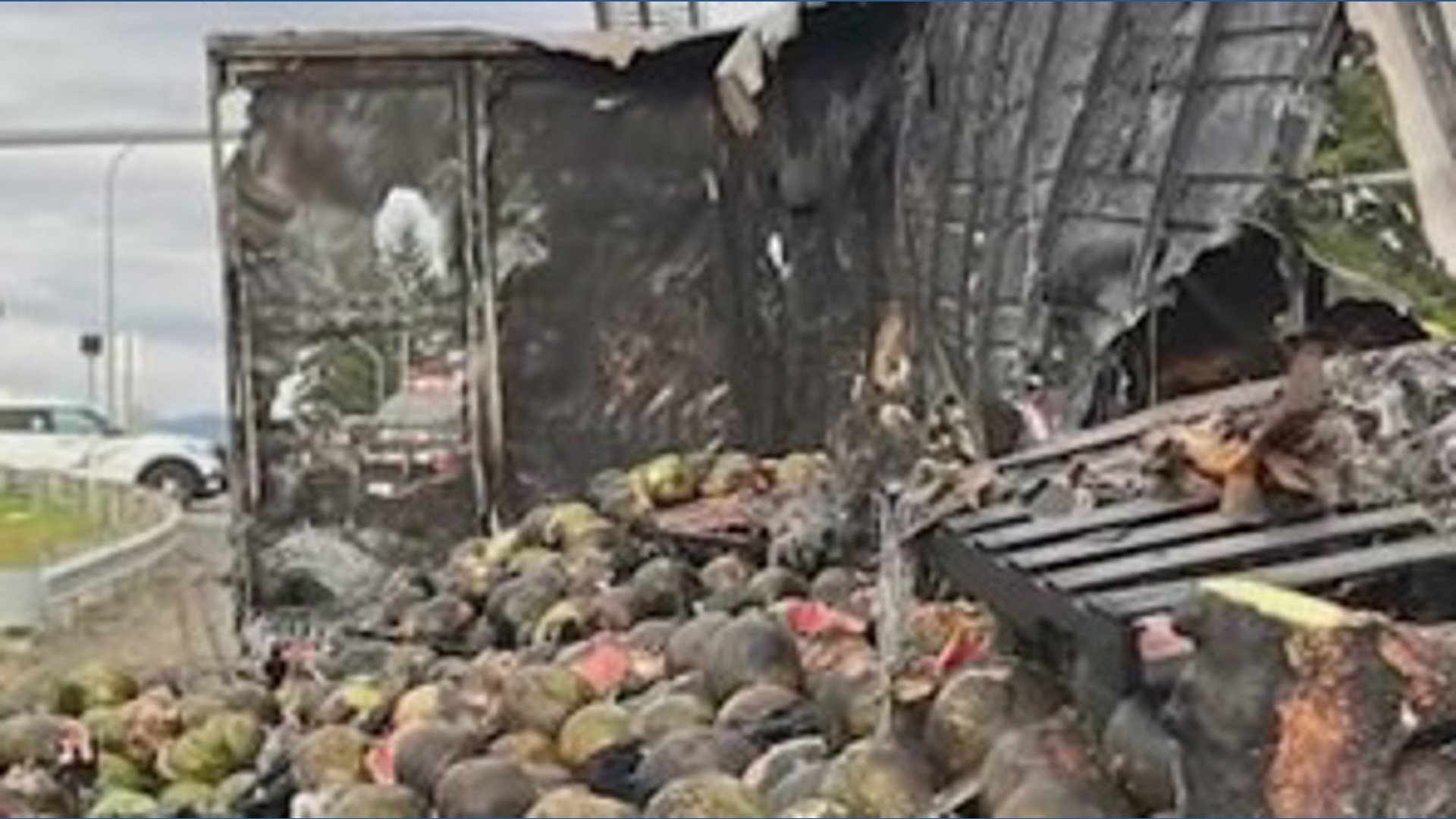 Truck carrying watermelons catches on fire