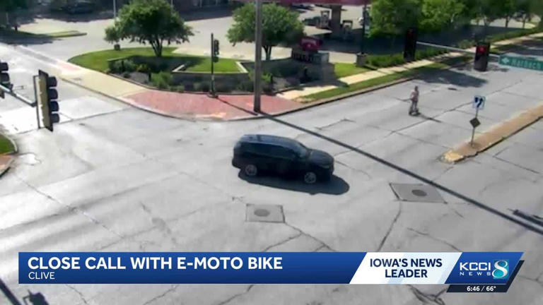 Police release video of person on e-scooter running red light before ...