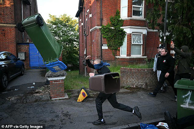 Man who hurled dustbins and taunted police during Henry Novak protests ...