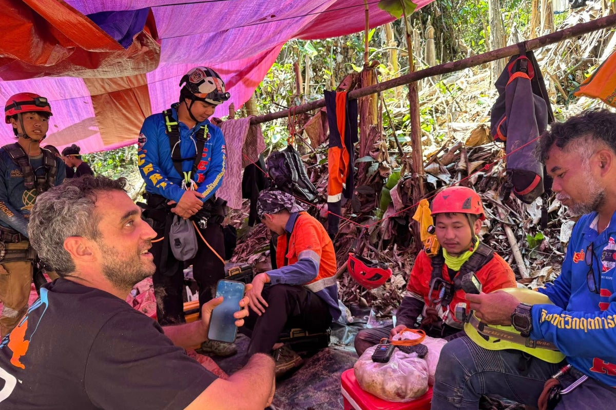 Search resumes for two men missing deep inside flooded Laos gold mine