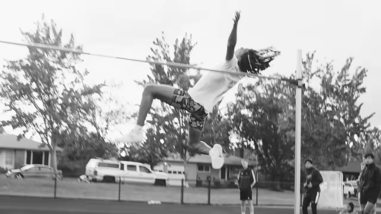 The high jump competition started at 3'6" - it ended somewhere crazy