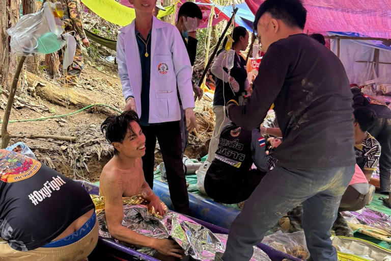 Search resumes for two men missing deep inside flooded Laos gold mine