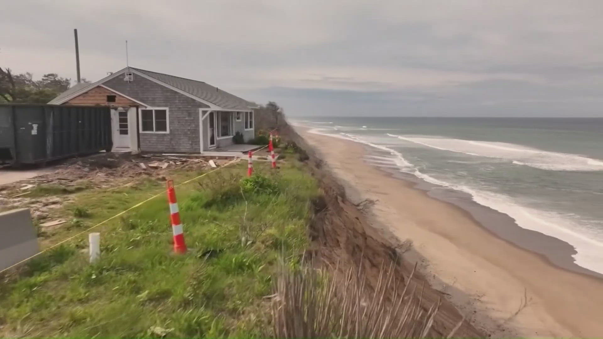 Cape Cod home teeters on ocean edge as erosion accelerates