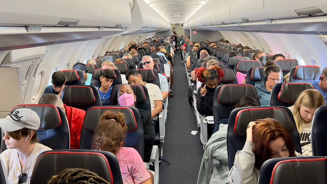 Flight attendants urge polite approach to seat-kicking disputes