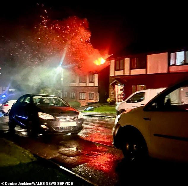Moment lightning bolt strikes home during thunderstorm - sparking ...