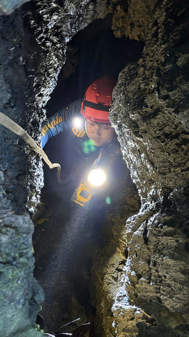 Search resumes for two men missing deep inside flooded Laos gold mine