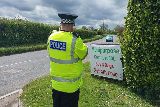 Police wait for drivers speeding through village