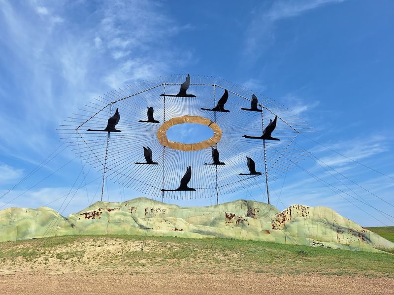 A flock of strange scrap metal geese stand frozen on a North Dakota prairie