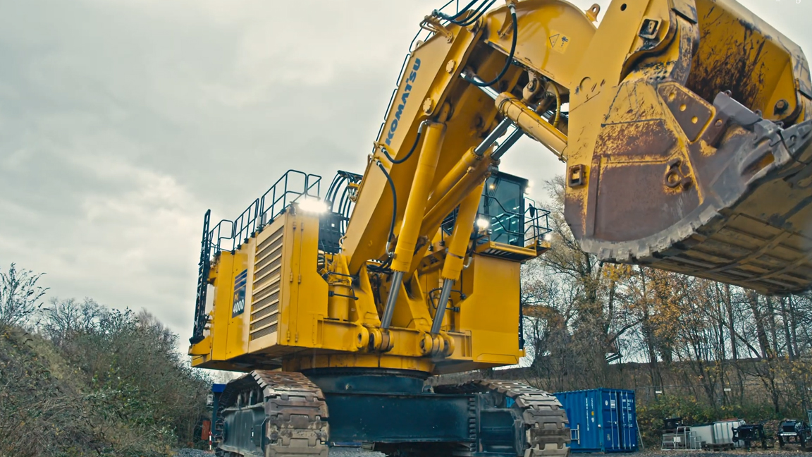 The moment this giant excavator starts moving massive earth loads