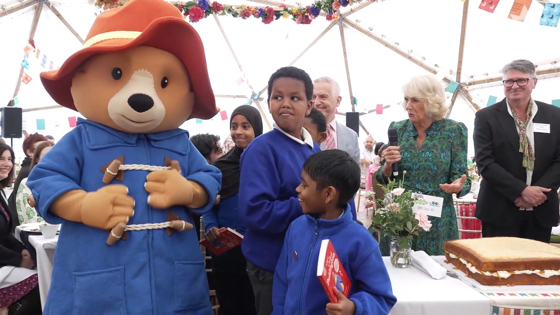 Queen Camilla joins Paddington Bear at British Library reading event